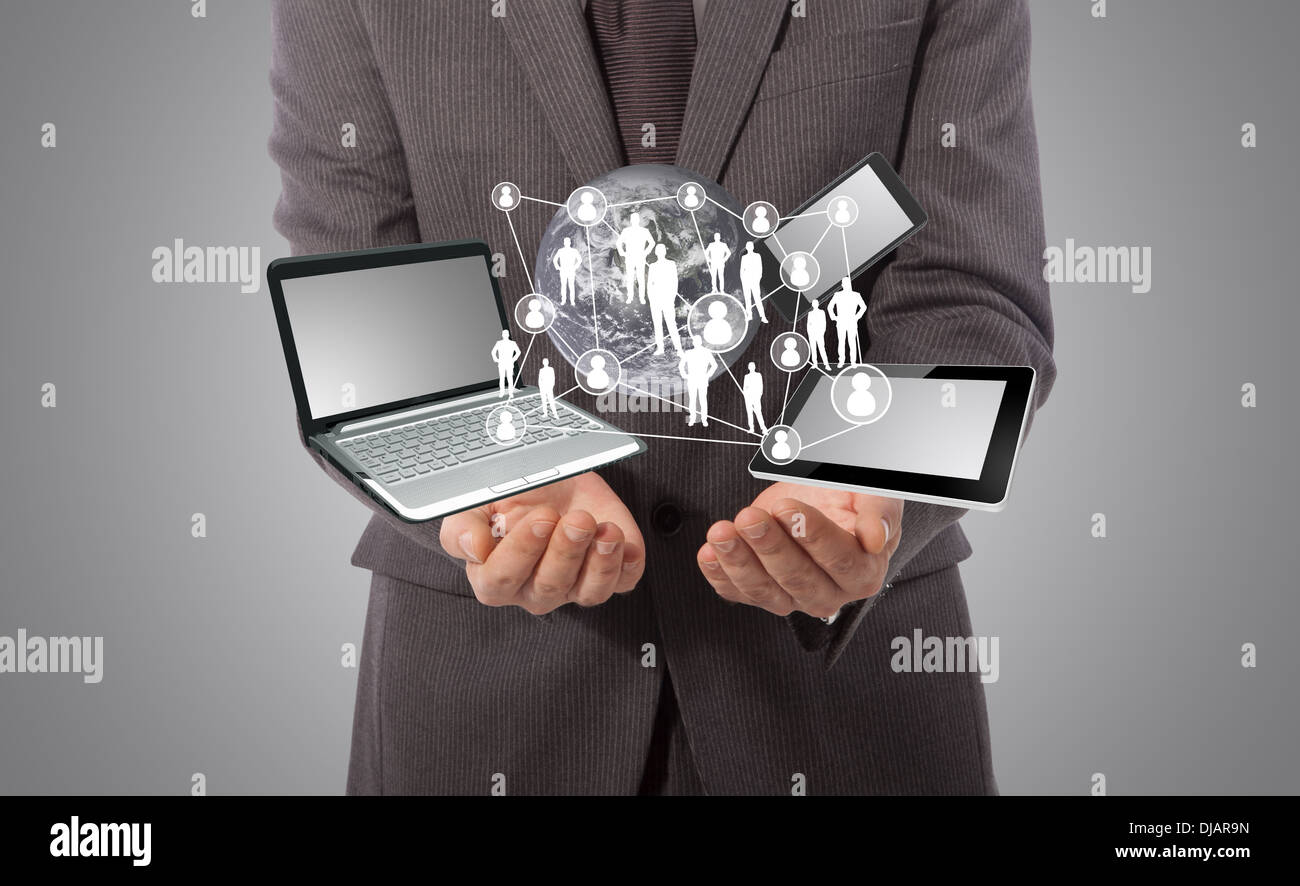 business man with technology concept in his hand, grey background Stock ...