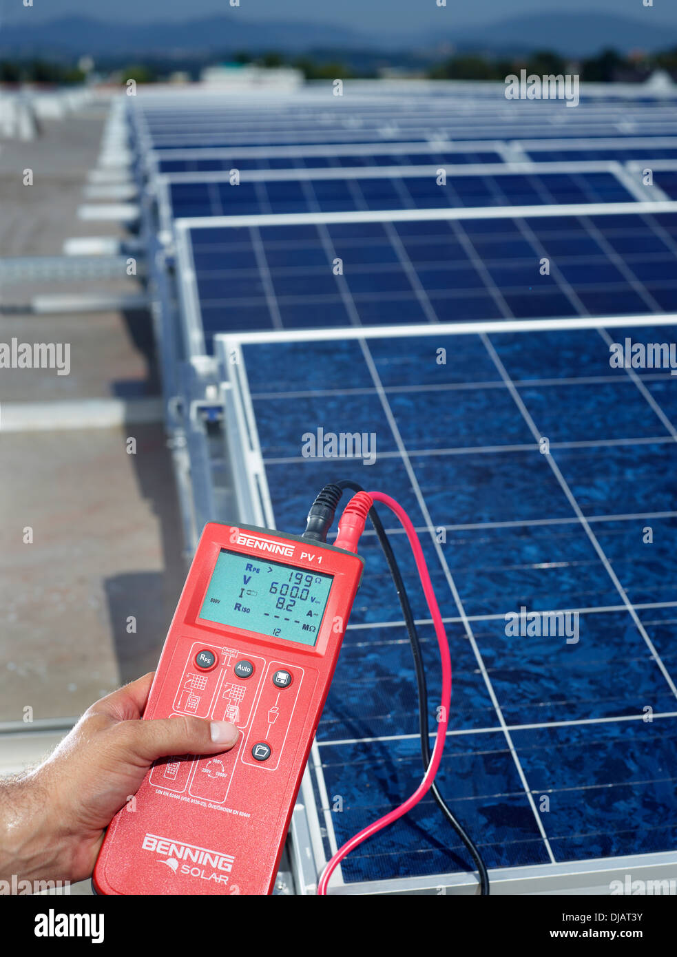 Voltmeter measuring the performance of a solar collector Stock Photo ...