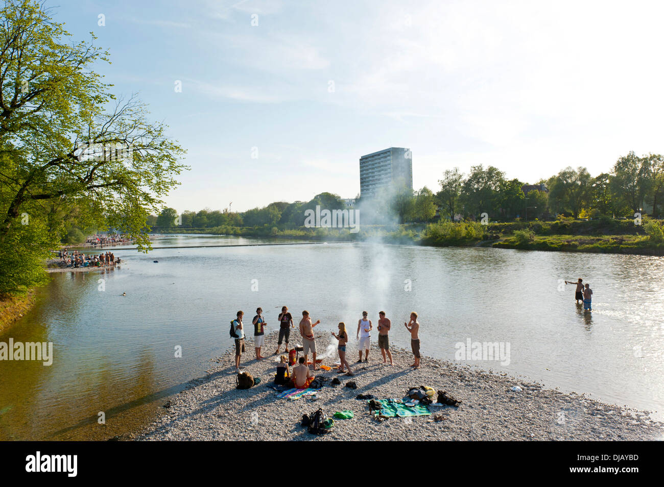 Young people having party on the Isar River in summer, Flaucher, Munich ...