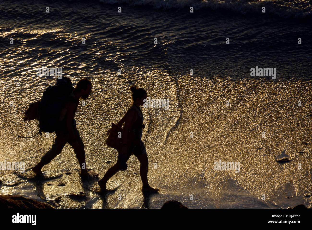 Two backpackers walking along the beach, Jeri, Ceará, Brazil Stock ...