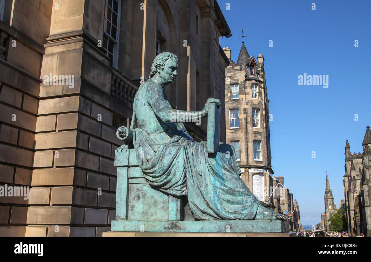 David Hume Statue with St. Giles Cathedral on the Royal Mile in ...