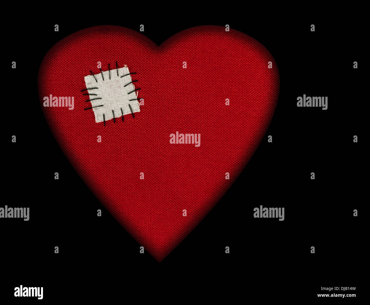 Patch on fabric heart Stock Photo - Alamy