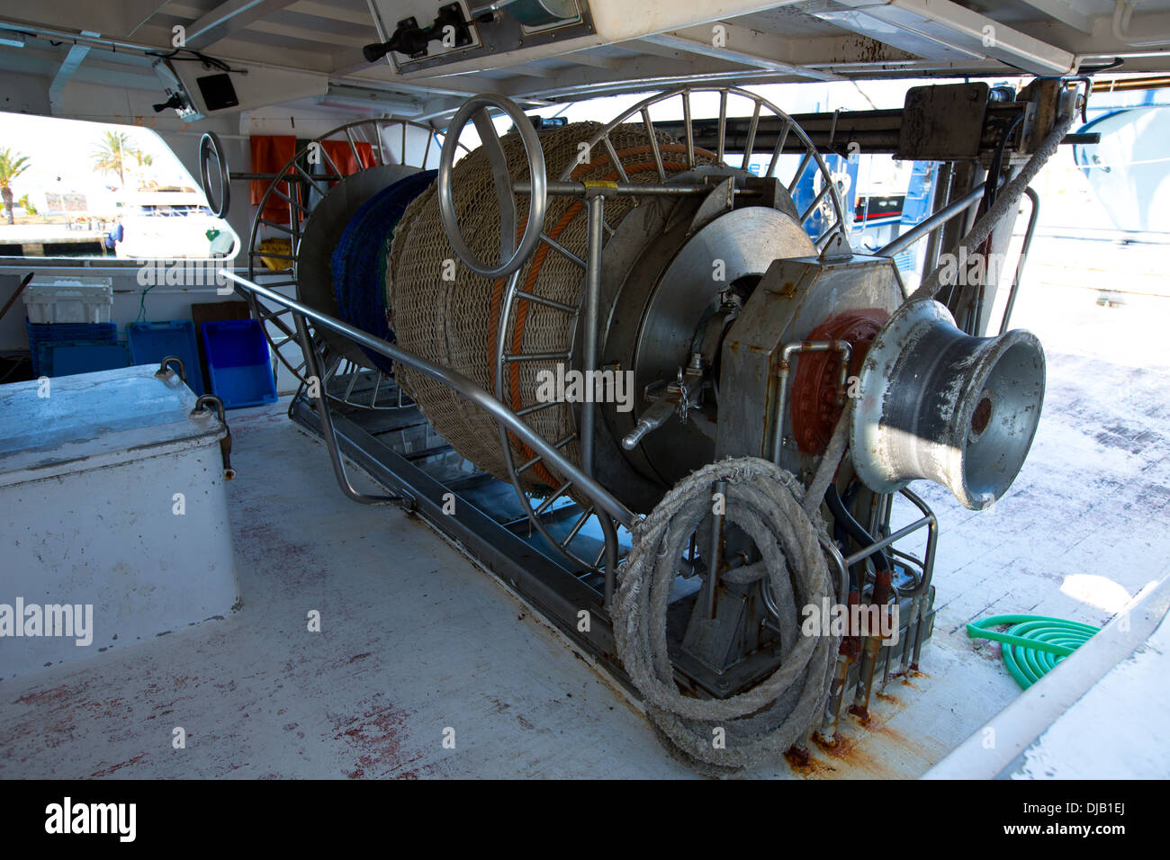 Fishing trawler boat engine motor huge winche on deck Stock Photo - Alamy