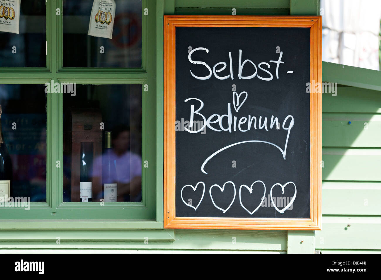 German sign saying you must order yourself, no table service, Munich ...