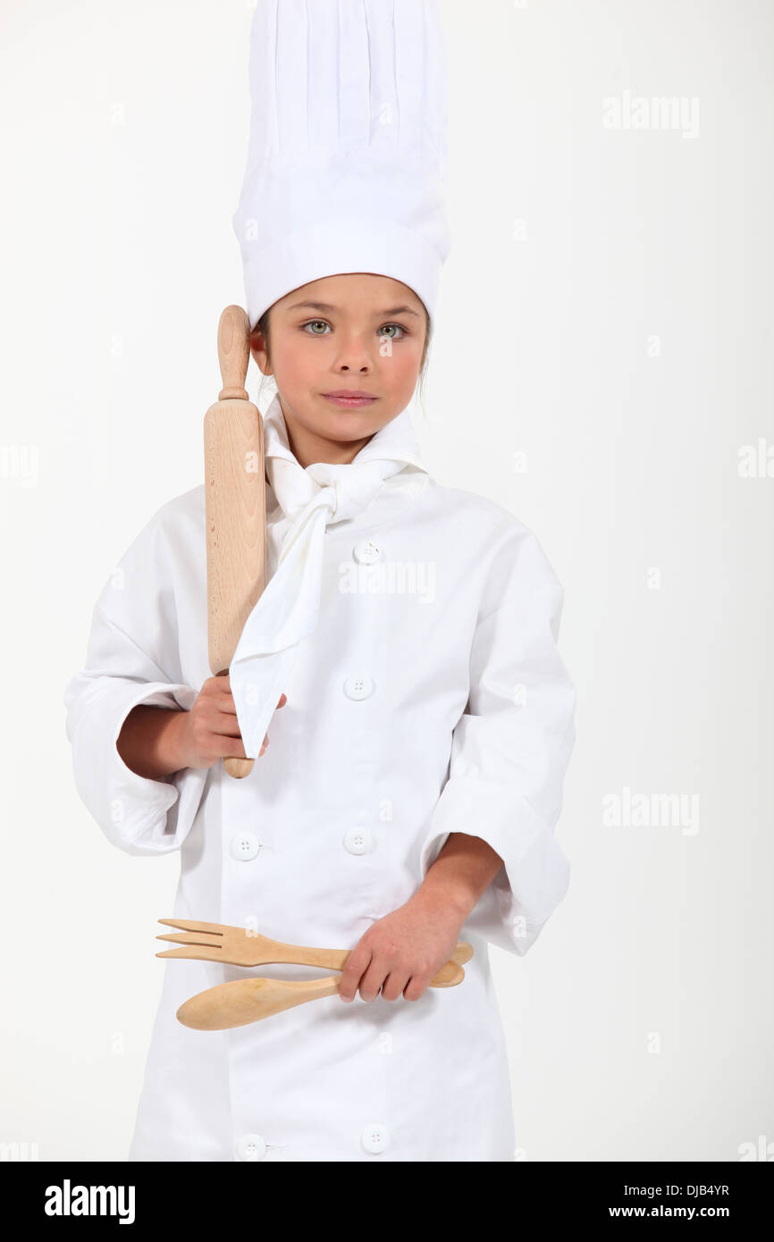 Girl dressed as a cook Stock Photo - Alamy