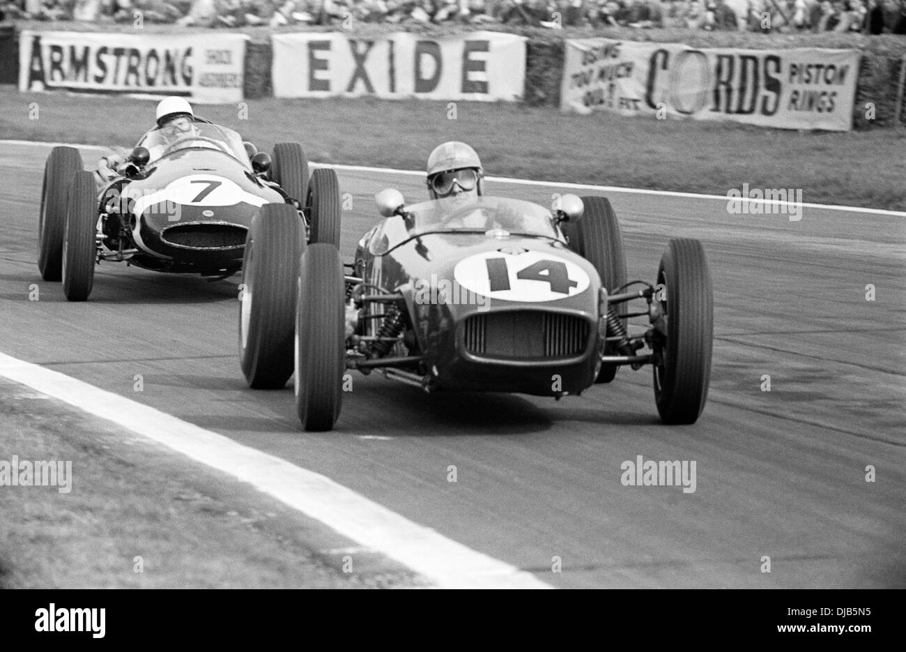 Innes Ireland in a Lotus 18 beating Stirling Moss in the Walker Cooper ...