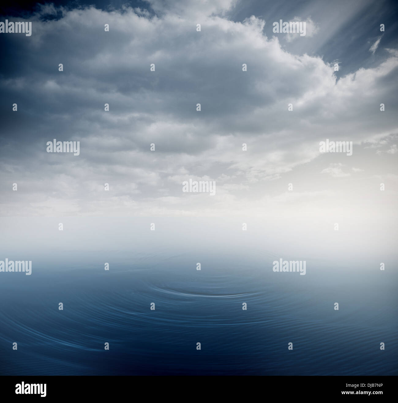 Cloudy sky over ocean Stock Photo - Alamy