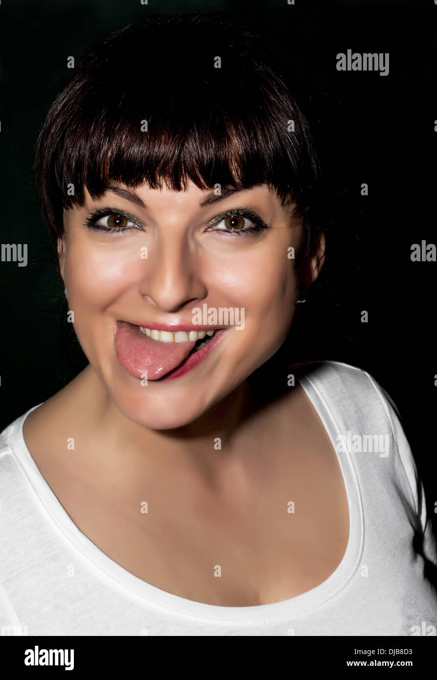 Grimacing grimace face tongue woman hi-res stock photography and images ...