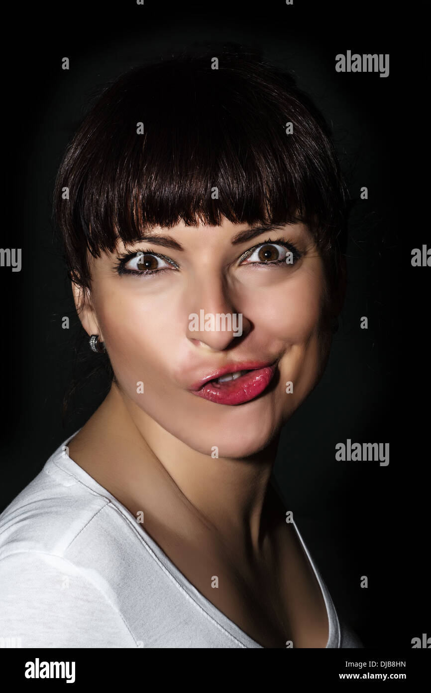 Grimacing grimace face tongue woman hi-res stock photography and images ...