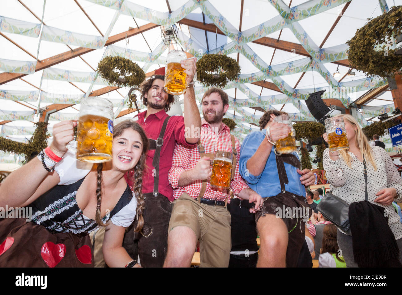 Germany, Bavaria, Munich, Oktoberfest, Young People Drinking Beer Stock ...