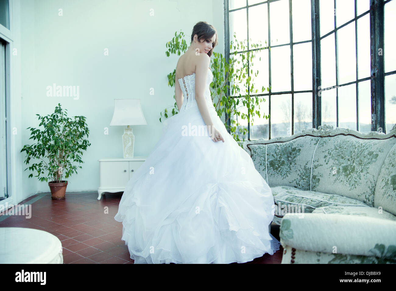 Alluring brunette bride waiting for her wedding Stock Photo - Alamy