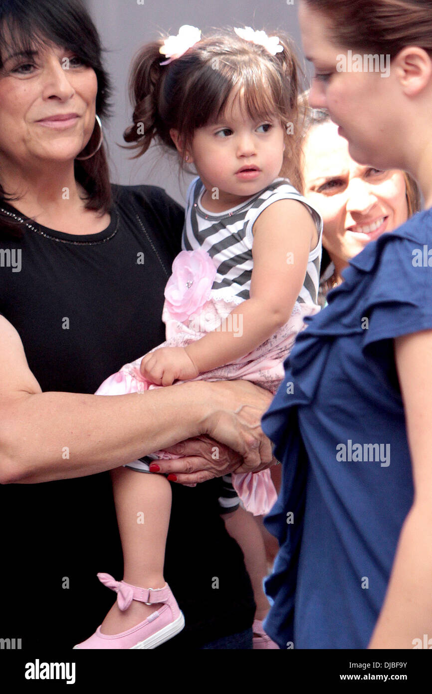 Gia Lopez, daughter of Mario Lopez watching Elmo at The Grove to appear ...