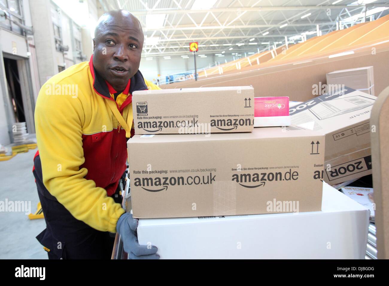 DHL staff member Fatahu Lütje sorts parcels at the new DHL distribution ...