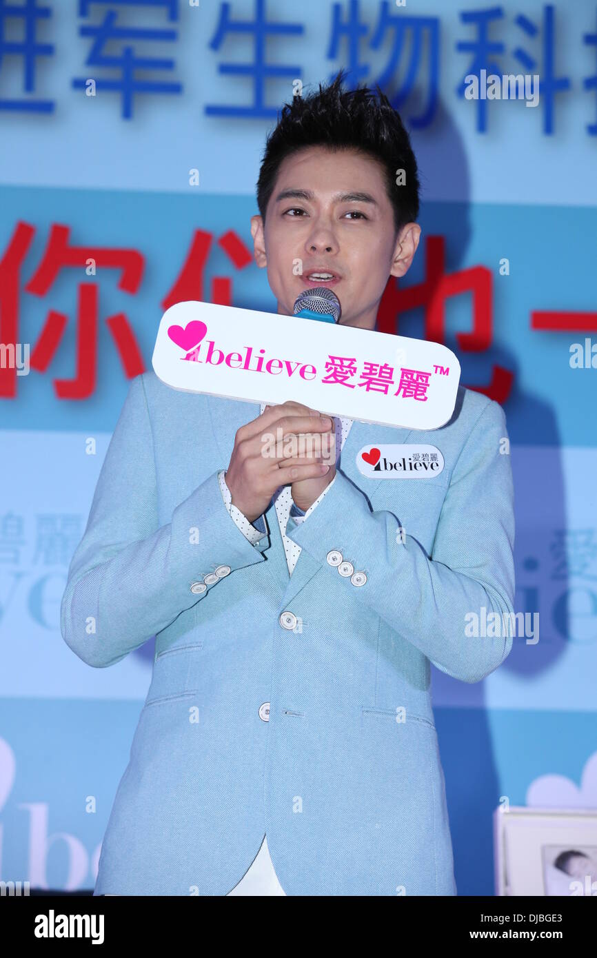 Shanghai, China. 22nd Nov, 2013. Actor Jimmy Lin attends commercial ...