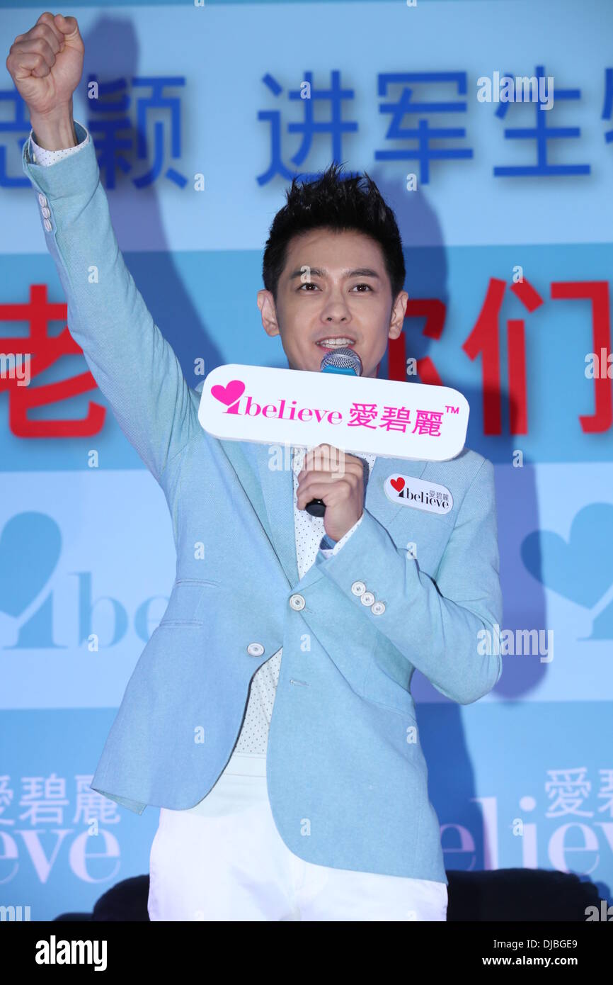 Shanghai, China. 22nd Nov, 2013. Actor Jimmy Lin attends commercial ...
