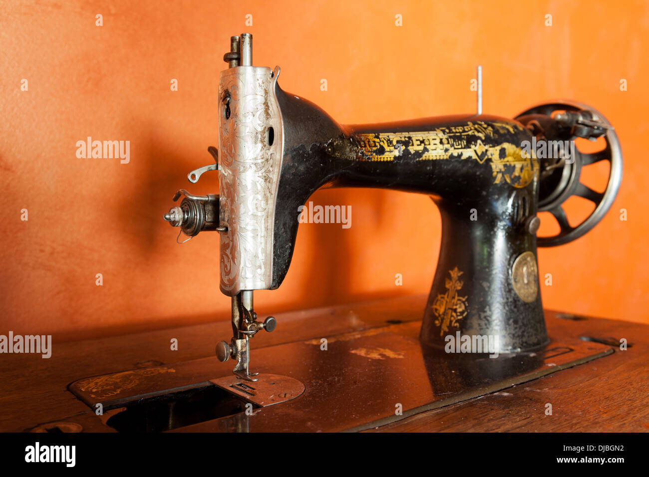 Classic retro style manual sewing machine ready for sewing work. The ...