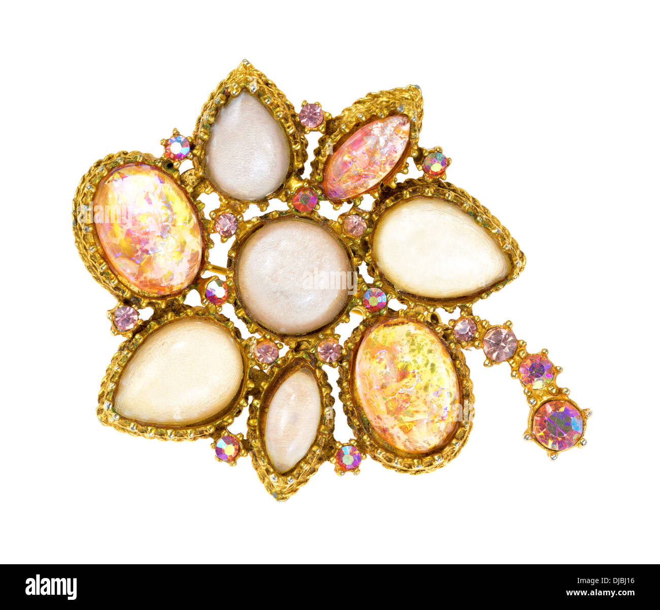 A very old brooch showing details on a white background Stock Photo - Alamy