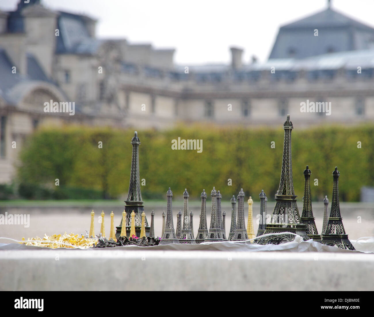 Mini Eiffel Towers with the Louvre in the background Stock Photo - Alamy