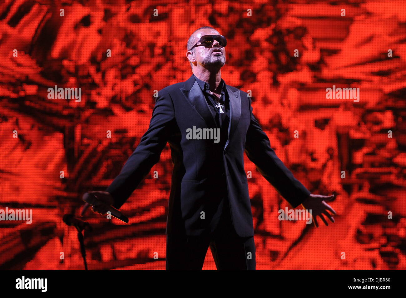 George Michael perforrms during his 'Symphonica' tour at the Palais ...