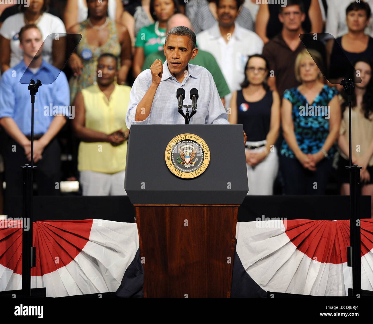 U.S. President Barack Obama takes the stage at a campaign rally at the ...