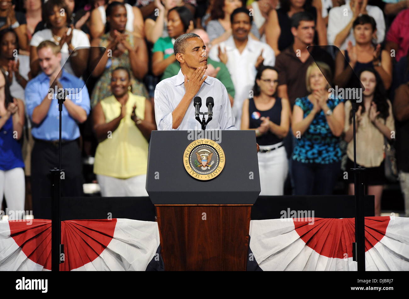 U.S. President Barack Obama takes the stage at a campaign rally at the ...