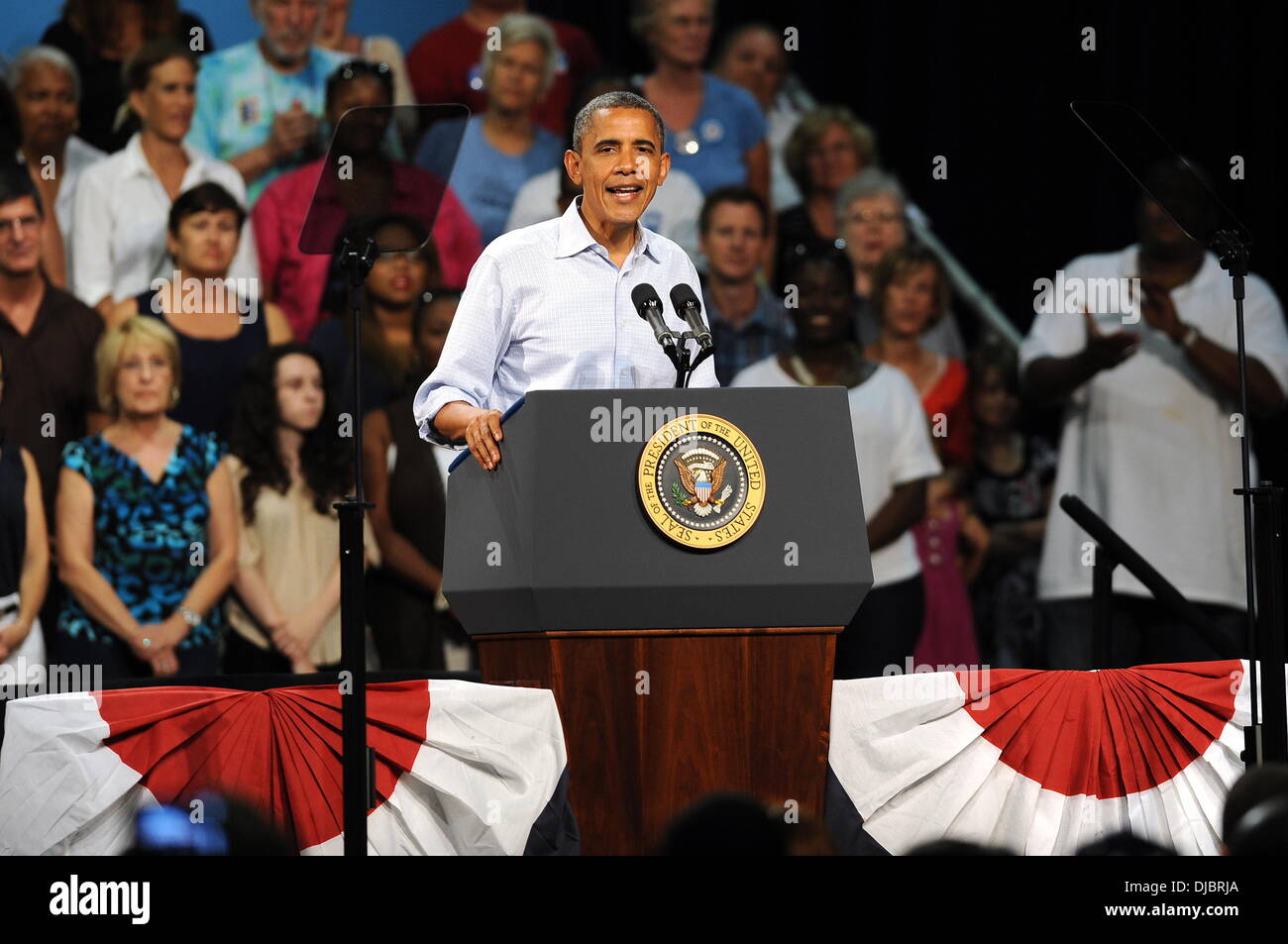 U.S. President Barack Obama takes the stage at a campaign rally at the ...