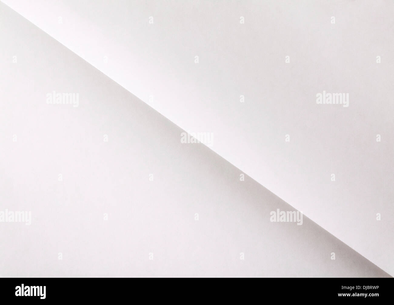 white sheet of paper folded in two,textured Stock Photo - Alamy