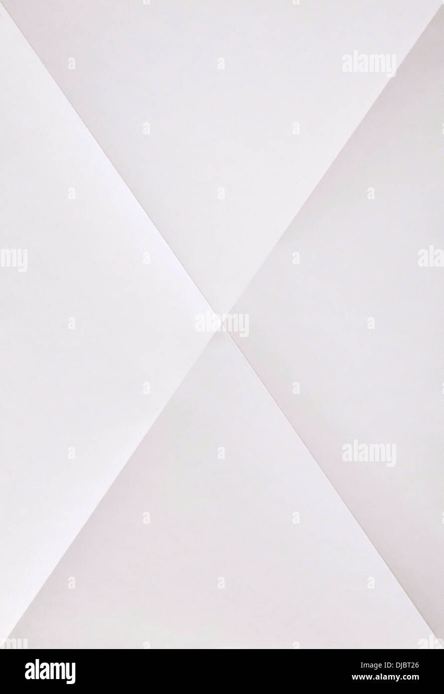 white sheet of paper folded in four, textured Stock Photo - Alamy