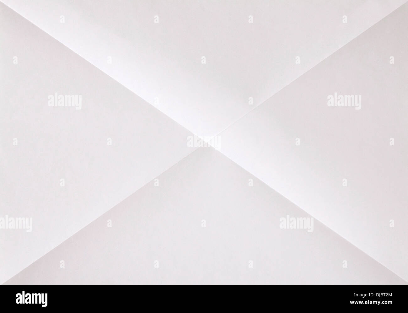 white sheet of paper folded in four, textured Stock Photo - Alamy