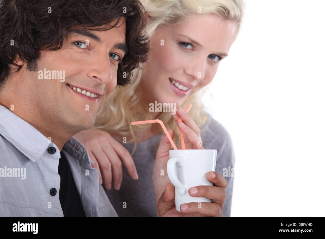 Sharing beverage two straws hi-res stock photography and images - Alamy