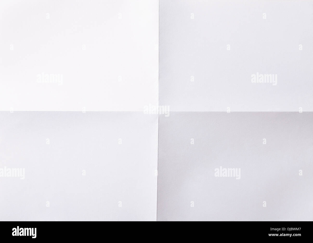 white sheet of paper folded in four Stock Photo - Alamy