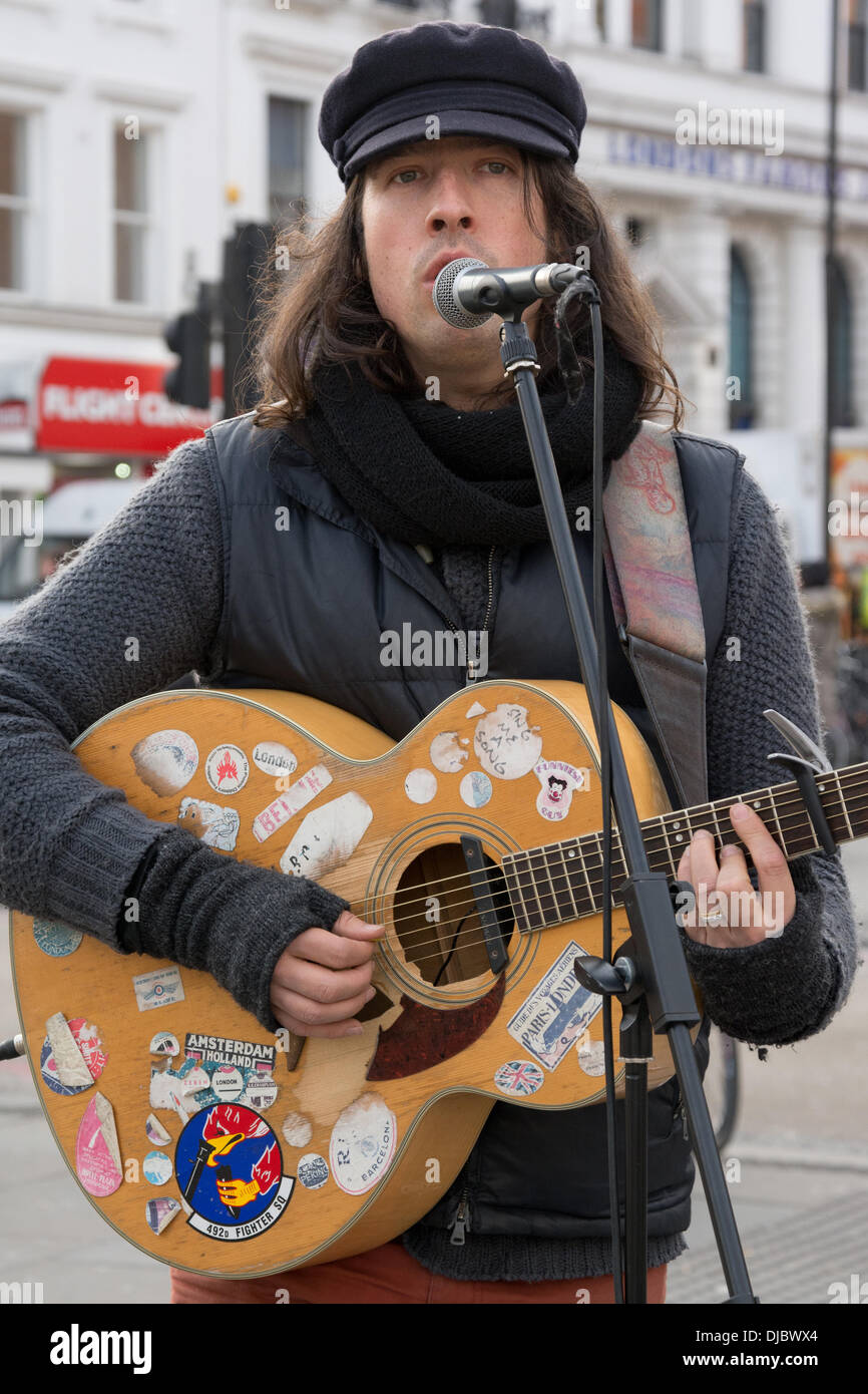 Camden, London, UK. 26th November 2013. Buskers perform in protest ...