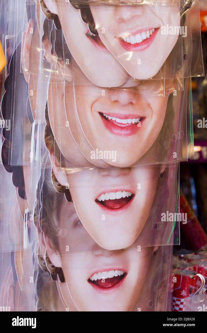 Cardboard face masks of One Direction Stock Photo - Alamy