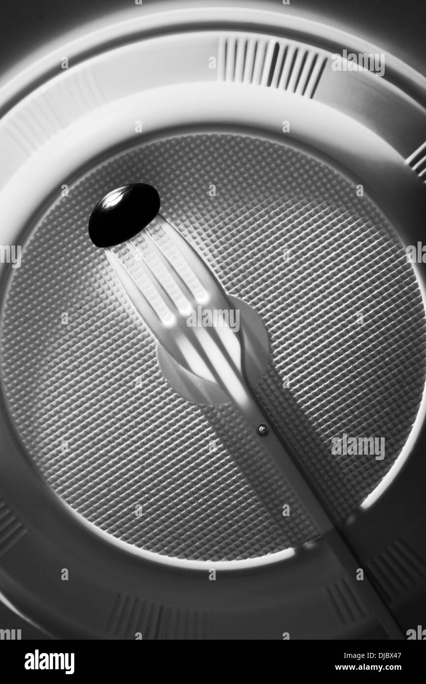 White plate against light Black and White Stock Photos & Images - Alamy