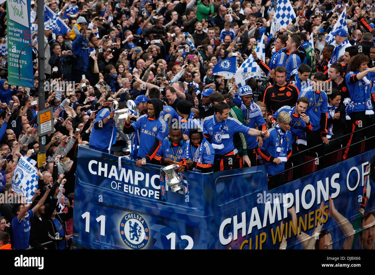 Chelsea's team members celebrate on a convertible bus their UEFA ...