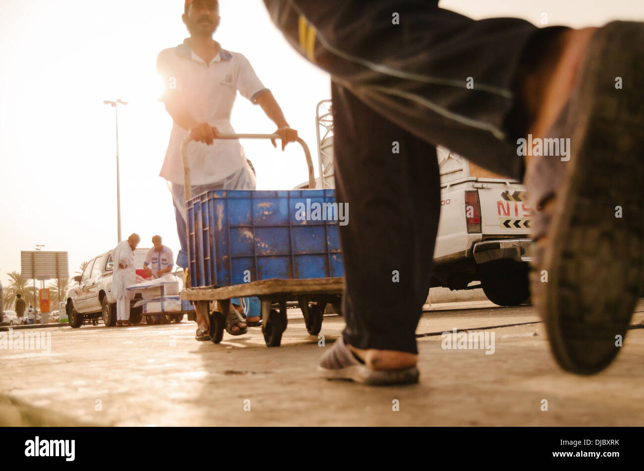 Arab men walking hi-res stock photography and images - Alamy