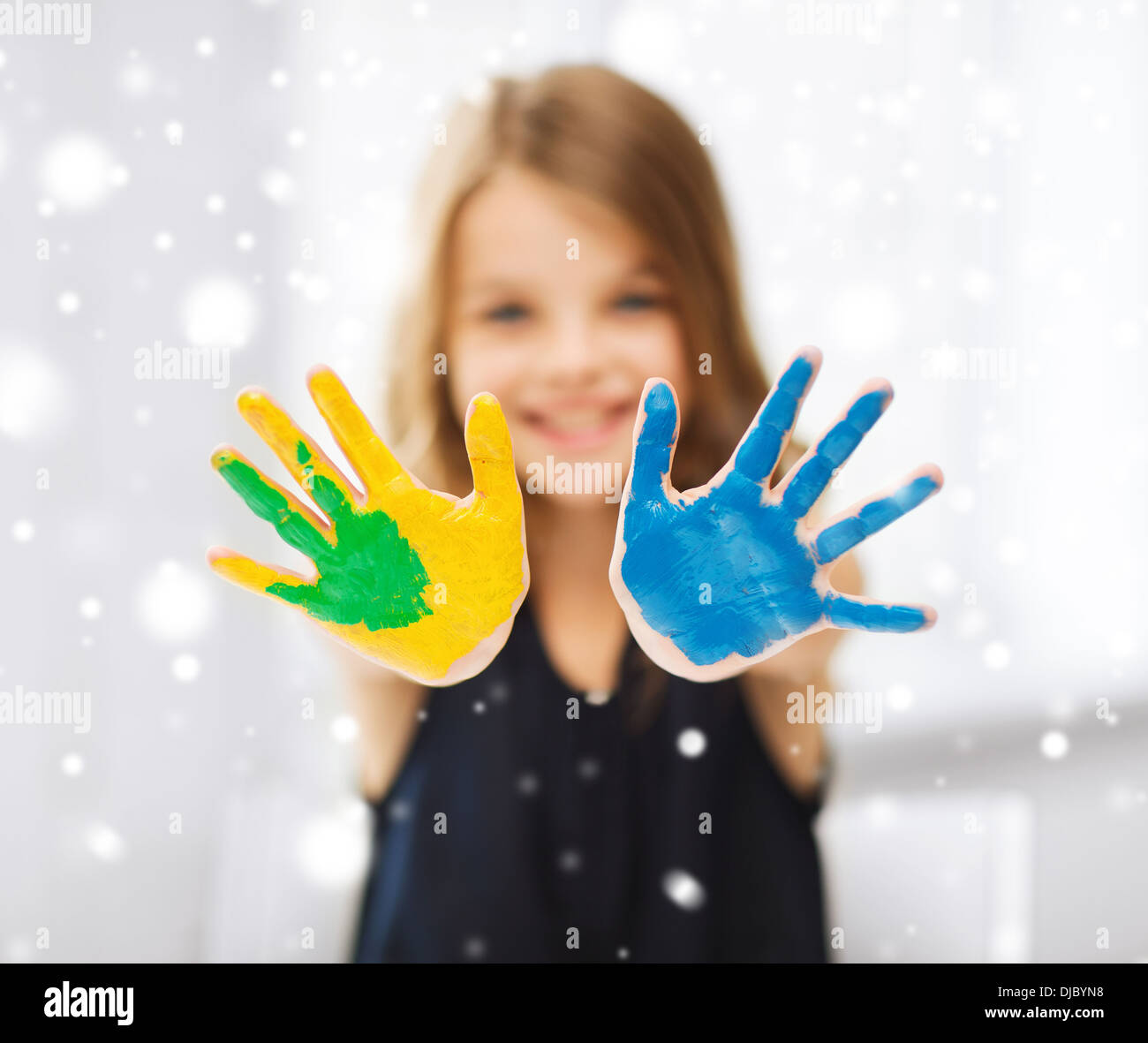 girl showing painted hands Stock Photo - Alamy