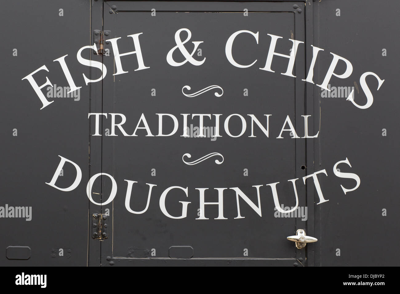 Traditional Fish and Chips Sign on back of a mobile snack wagon Stock ...