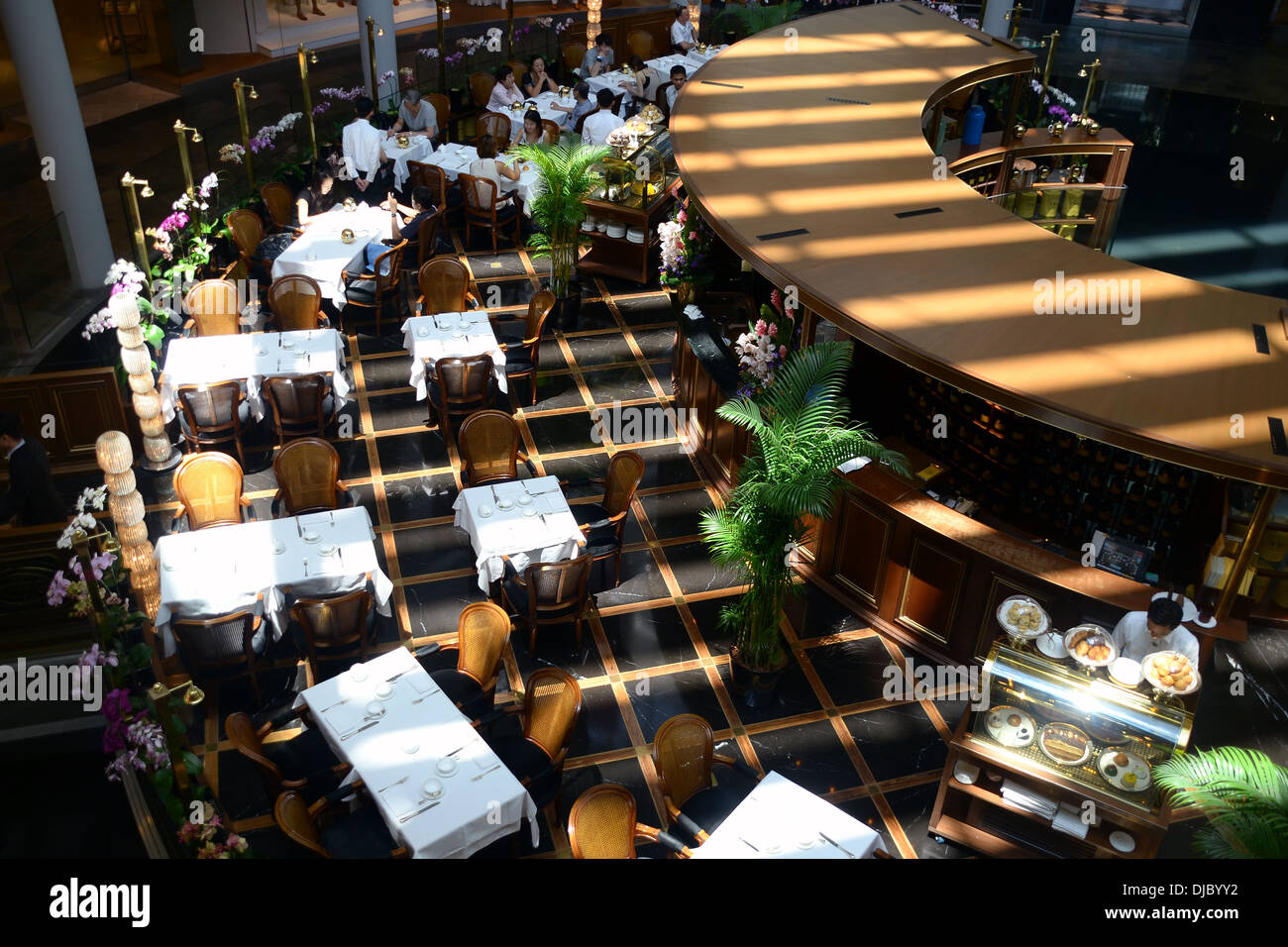 Cafe with sunlight and shadows Stock Photo - Alamy