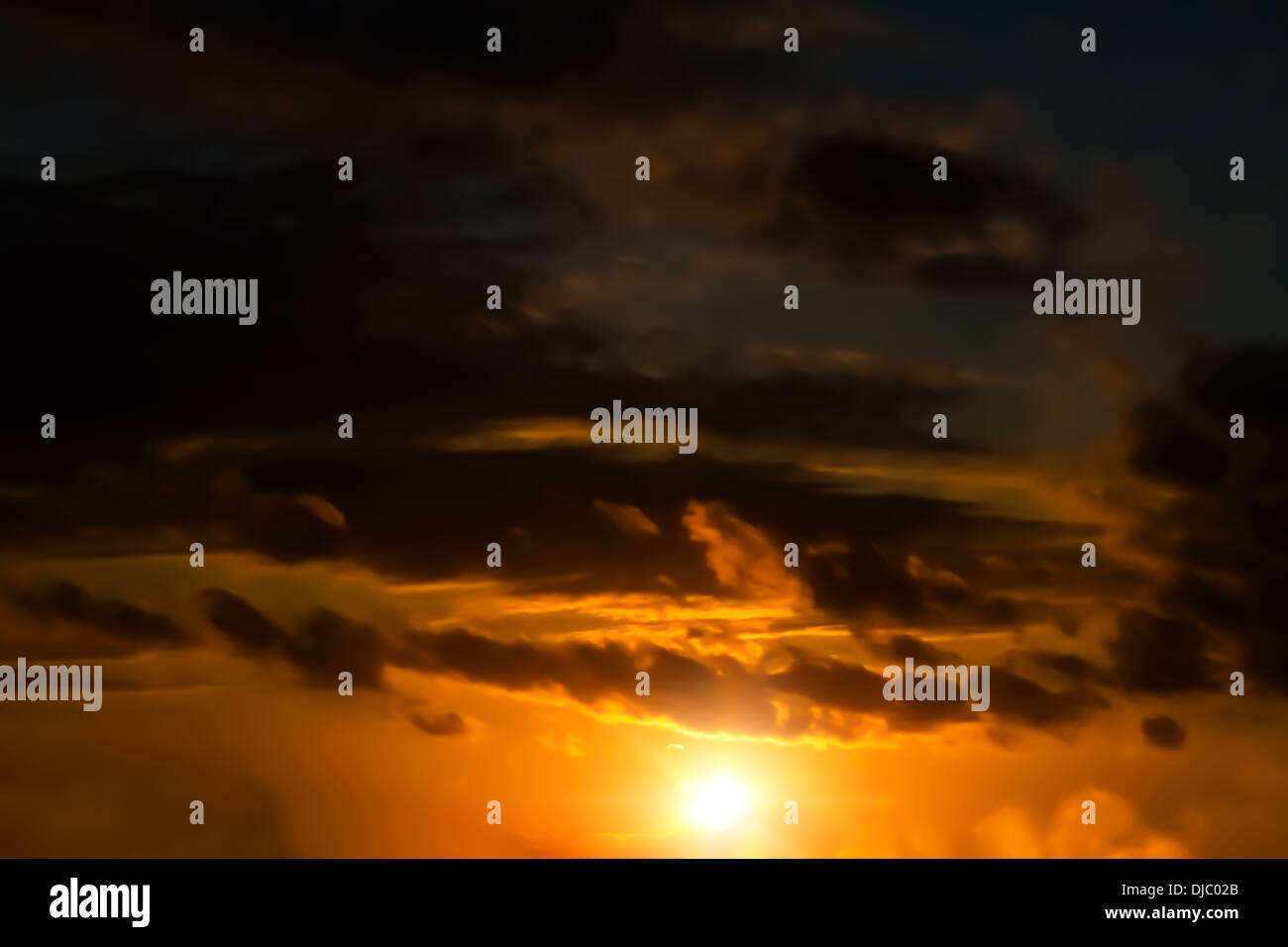 Dramatic Orange low sunset sky Stock Photo - Alamy