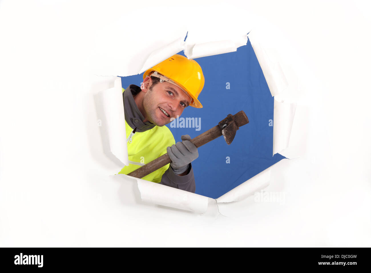 Builder with a pickaxe Stock Photo - Alamy