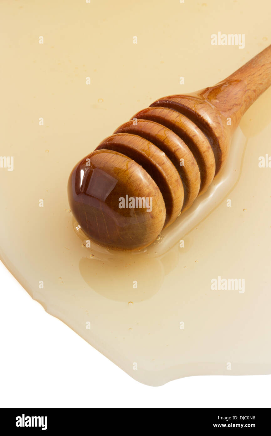 honey and stick isolated on white background Stock Photo - Alamy