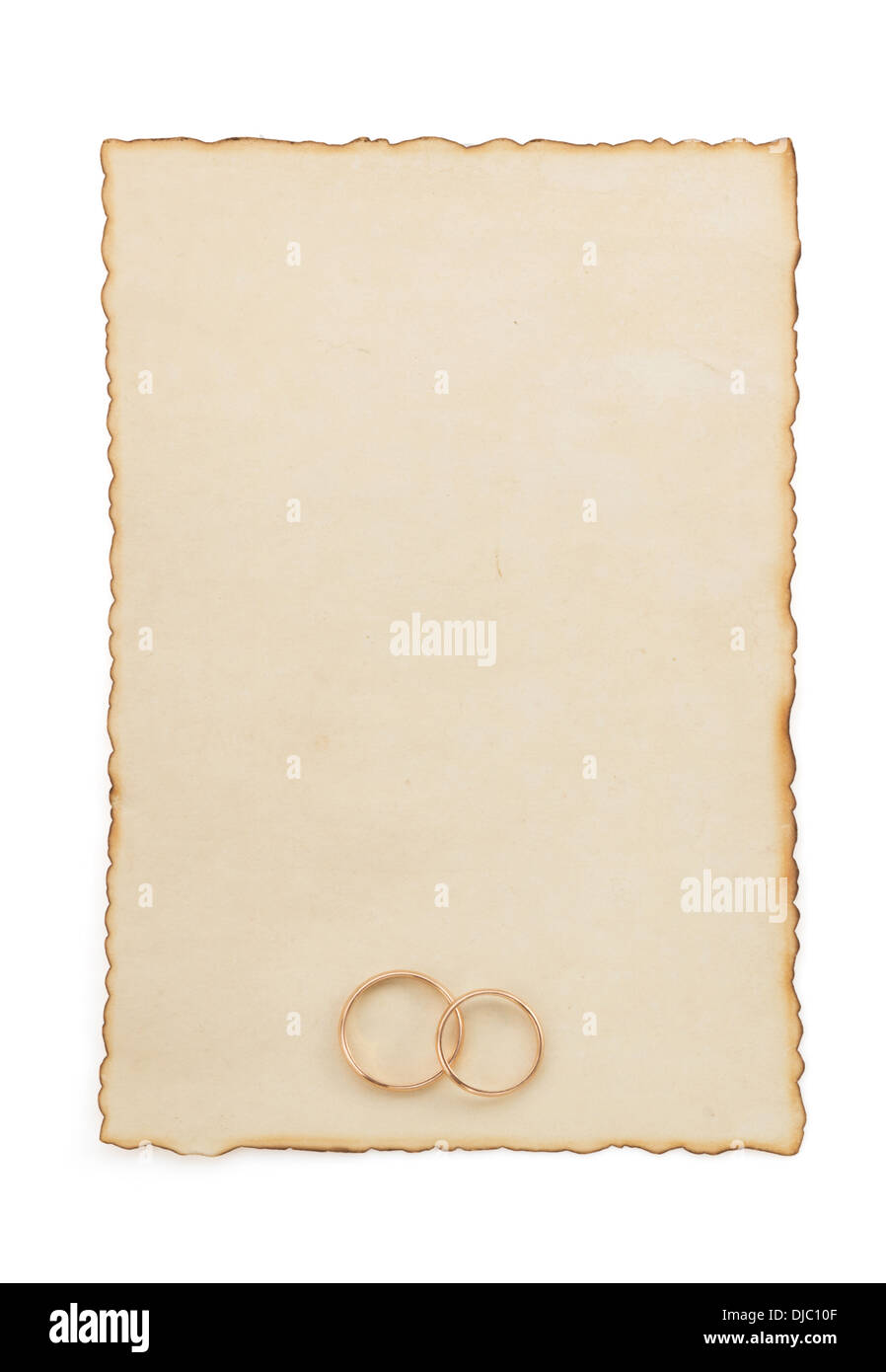 wedding ring and aged paper isolated on white background Stock Photo ...