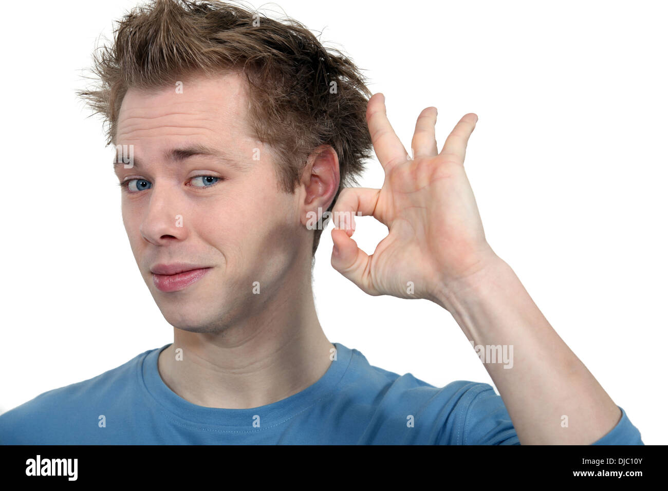 young man making okay sign Stock Photo - Alamy