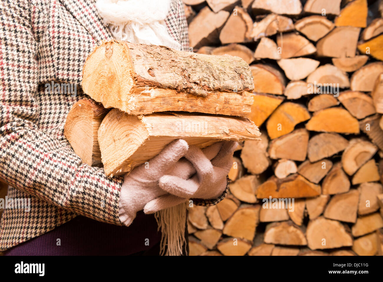 Woman log carrying hi-res stock photography and images - Alamy