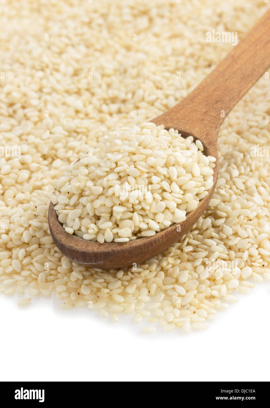 sesame seed in spoon isolated on white background Stock Photo - Alamy