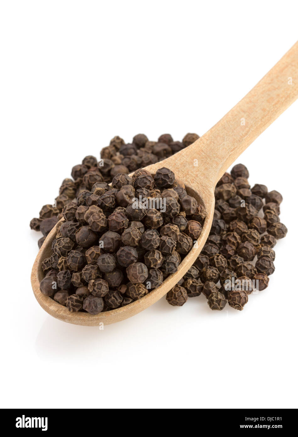 pepper in spoon isolated on white background Stock Photo - Alamy
