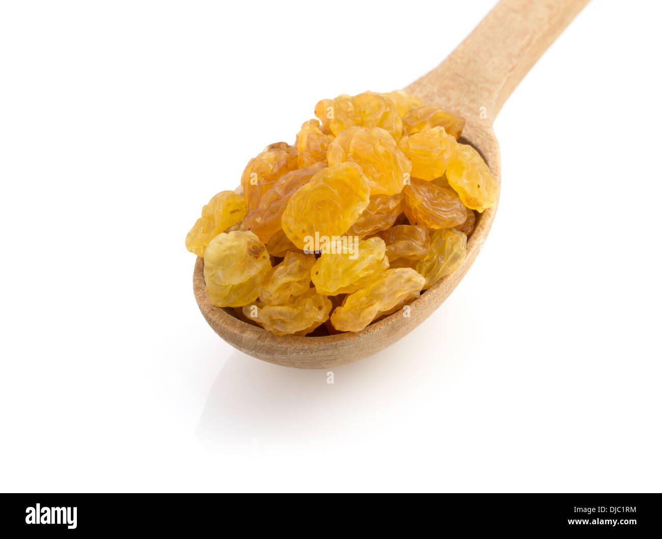 raisins in spoon isolated on white background Stock Photo - Alamy
