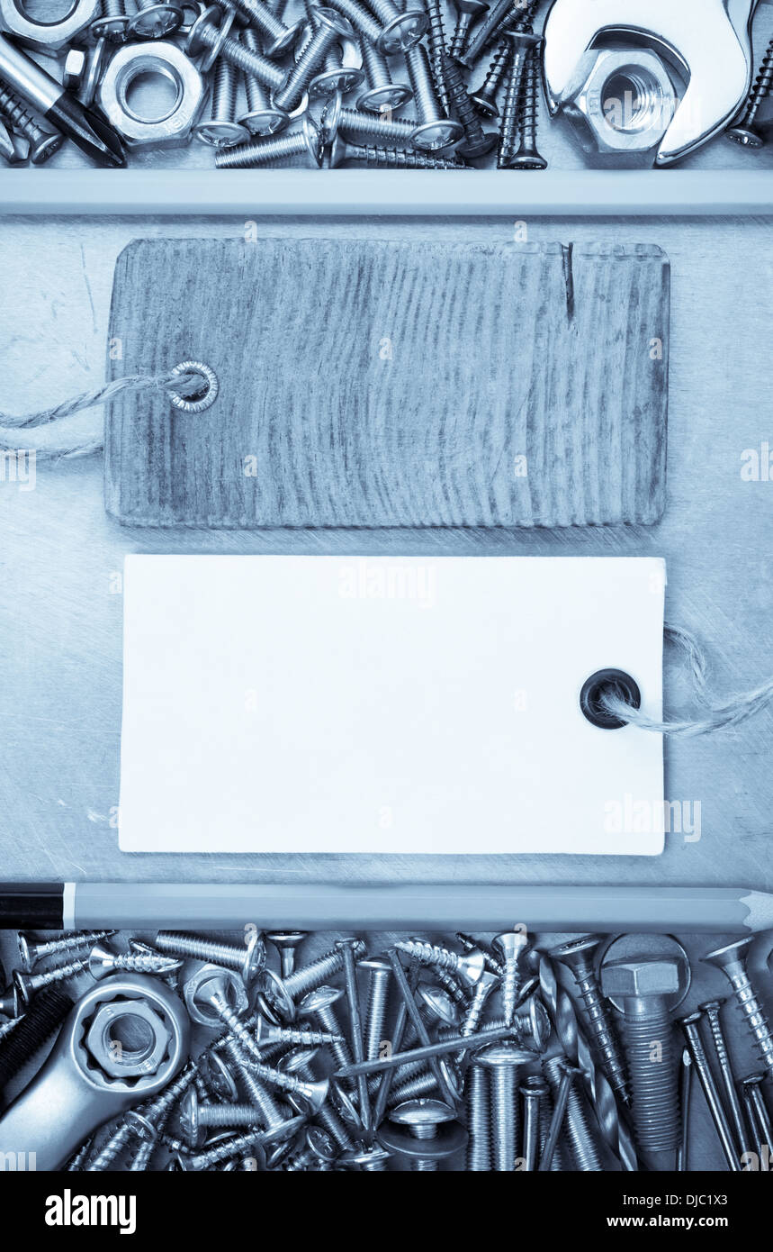 metal construction hardware tool on metal texture Stock Photo - Alamy
