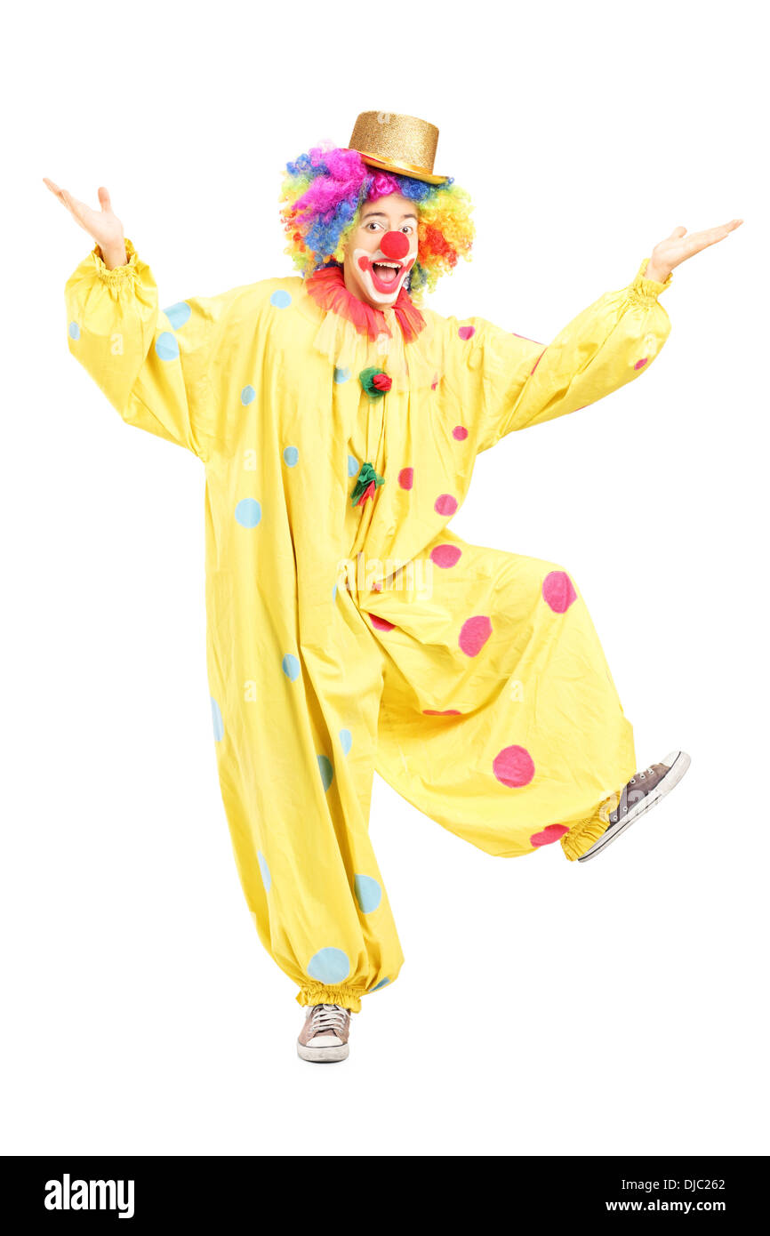 Full length portrait of a male funny circus clown posing Stock Photo ...